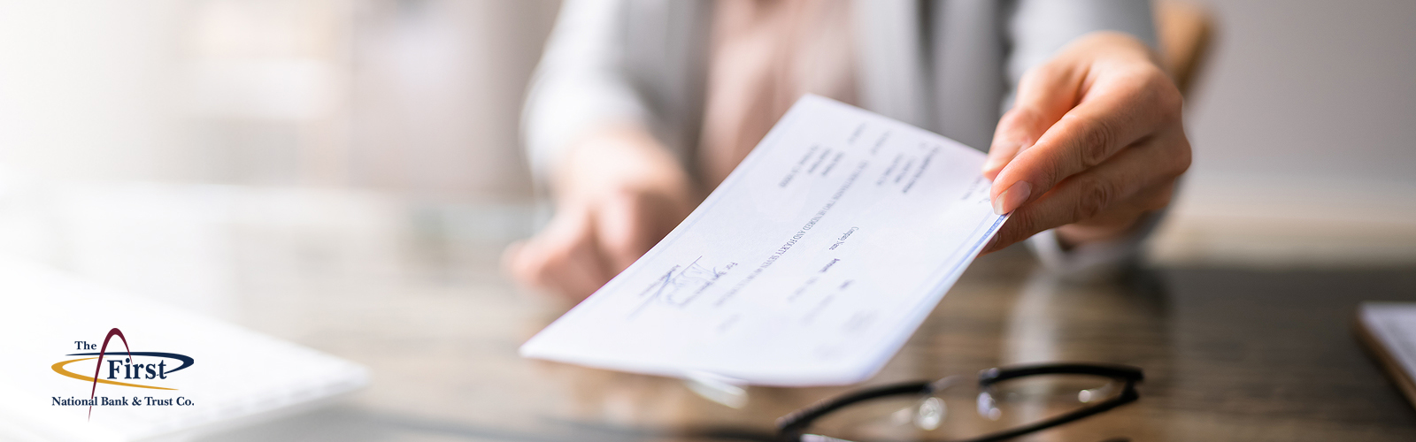 Reorder Checks - The First National Bank & Trust Co.